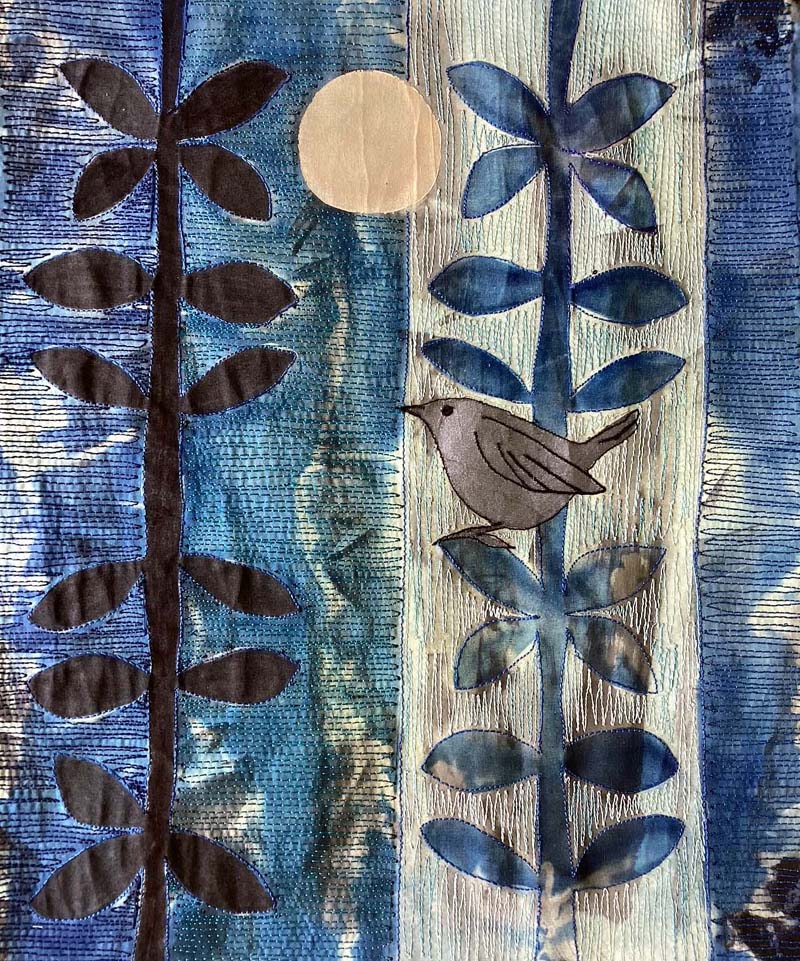 Luna - The moon depicted in textile imagery.
